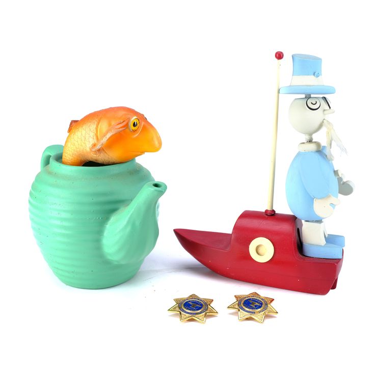Lot 233 - Teapot with Goldfish, Toy Boat and Anville Highway Patrol ...