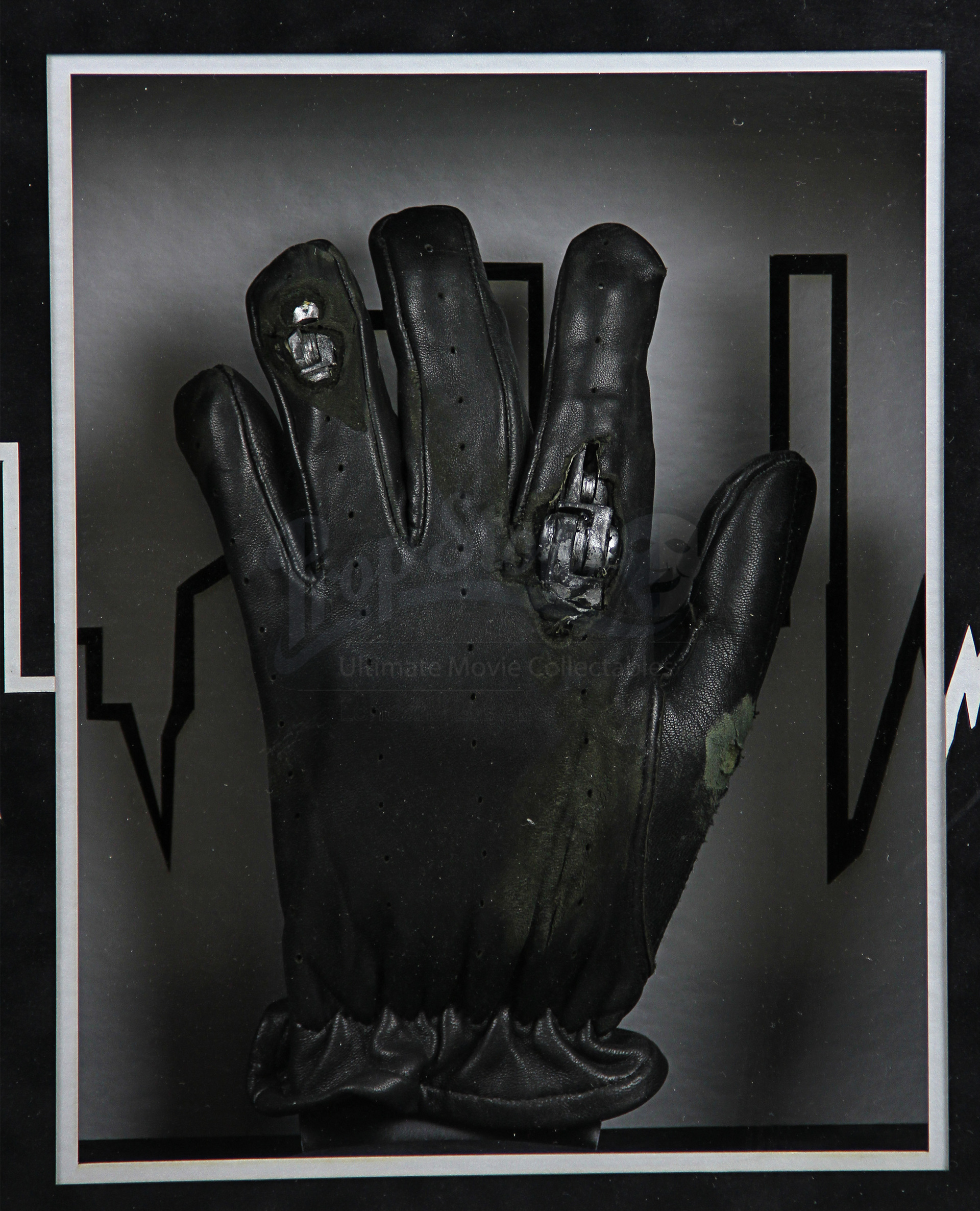 The Terminators (Arnold Schwarzenegger) Glove Display | Prop Store ...