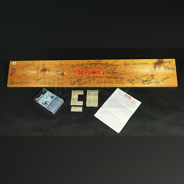Signed Wooden Plank With VHS Video Tape And Newspaper Clippings | PLANK ...