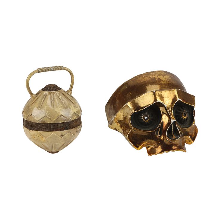 Lot # 1127: FLASH GORDON (1980) - Palace Guard Skull Mask and Hawkman Bomb