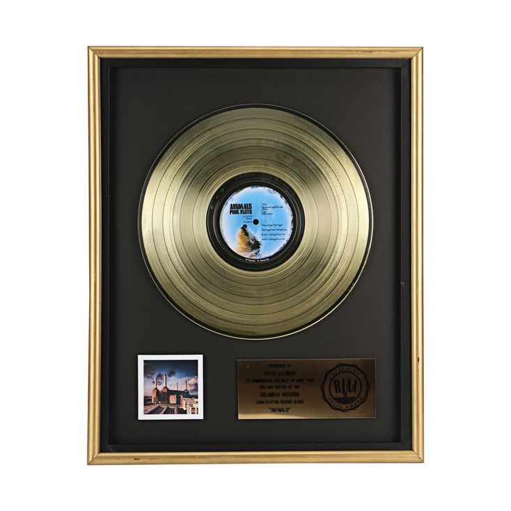 312. Animals Gold Disc Award Presented to David Gilmour ### PINK FLOYD