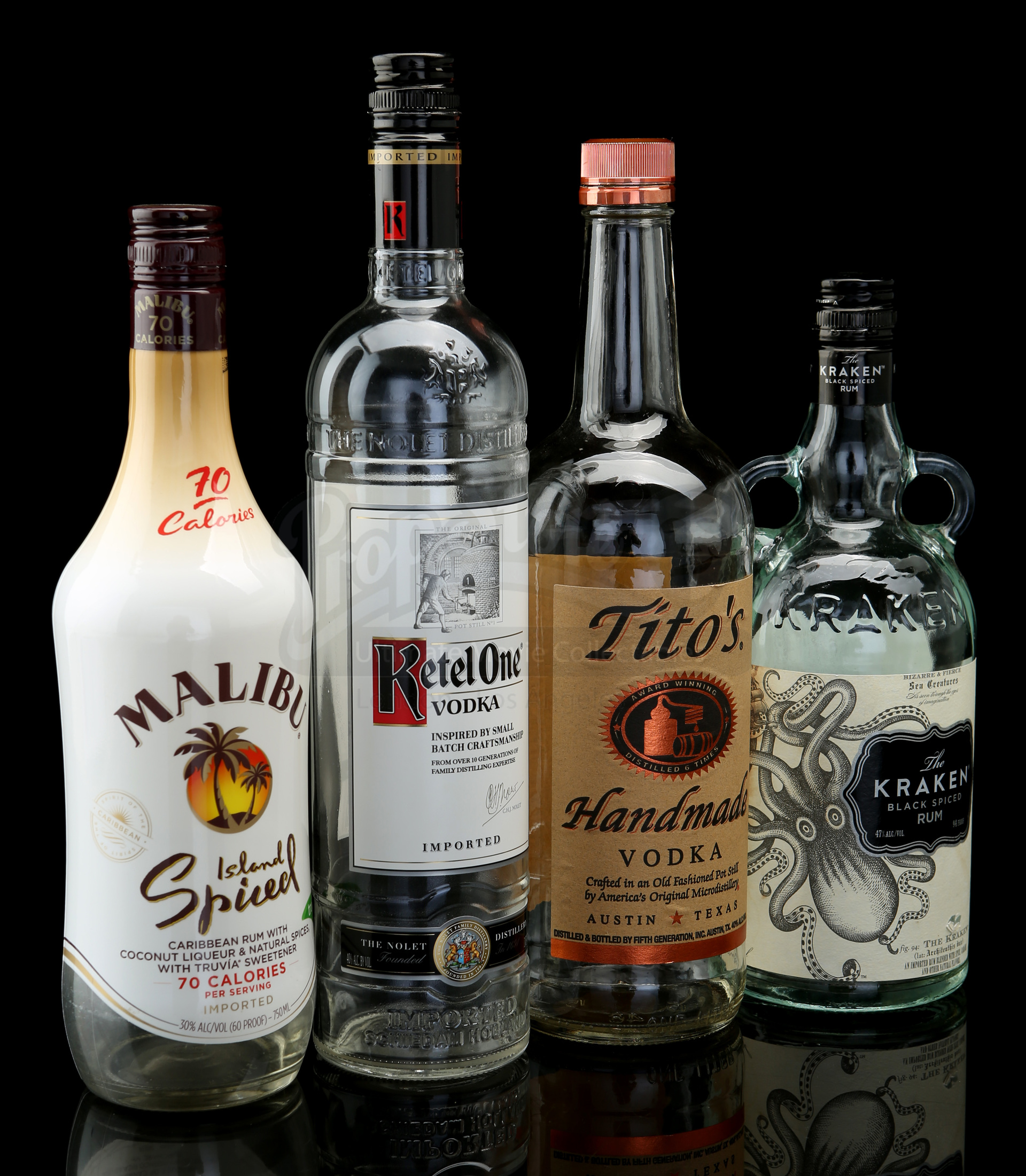 Lot # 533: Set of Four Harlem's Paradise Alcohol Bottles