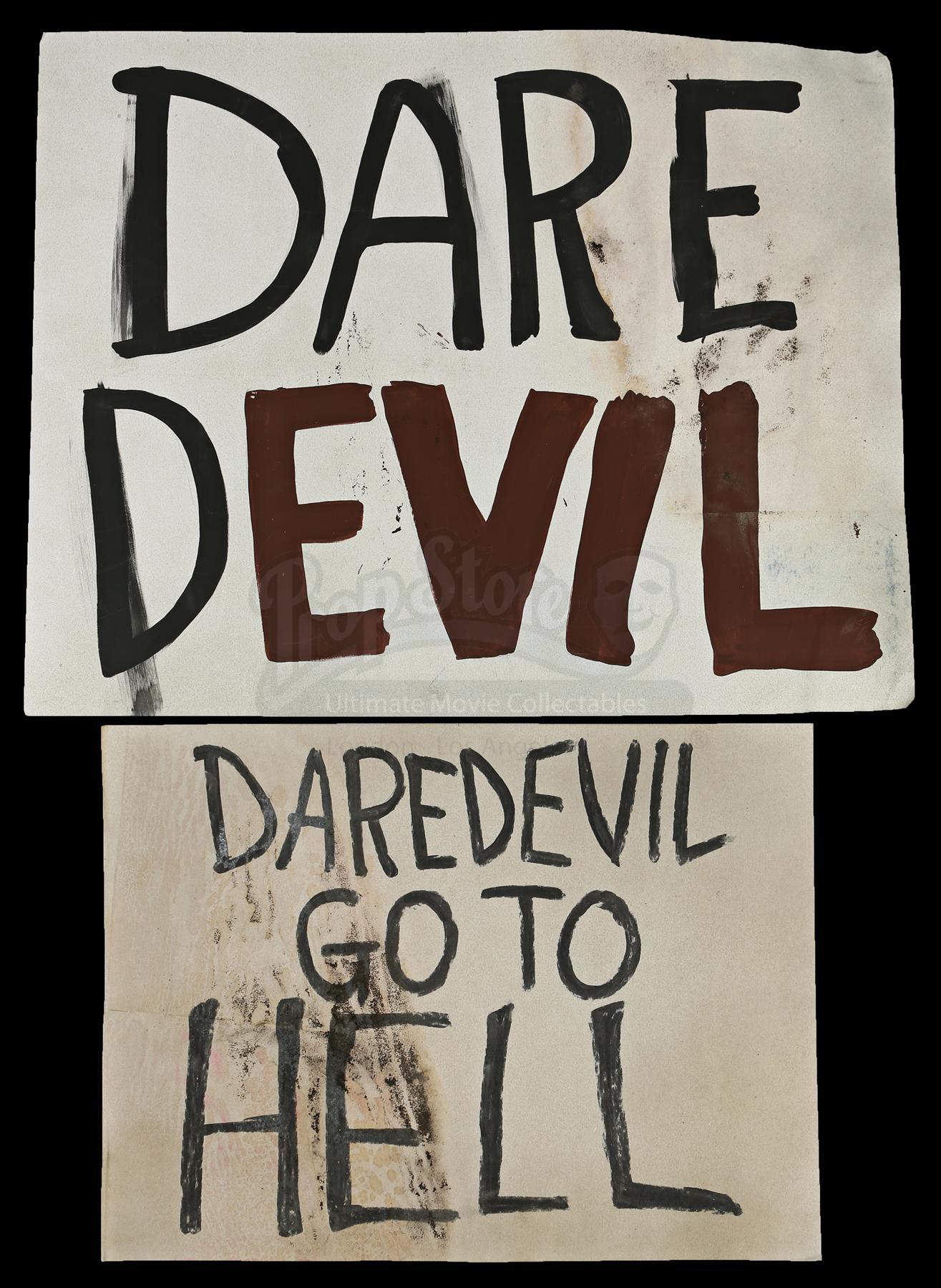 Lot # 370: 'Daredevil Go to Hell' Attack Protest Signs