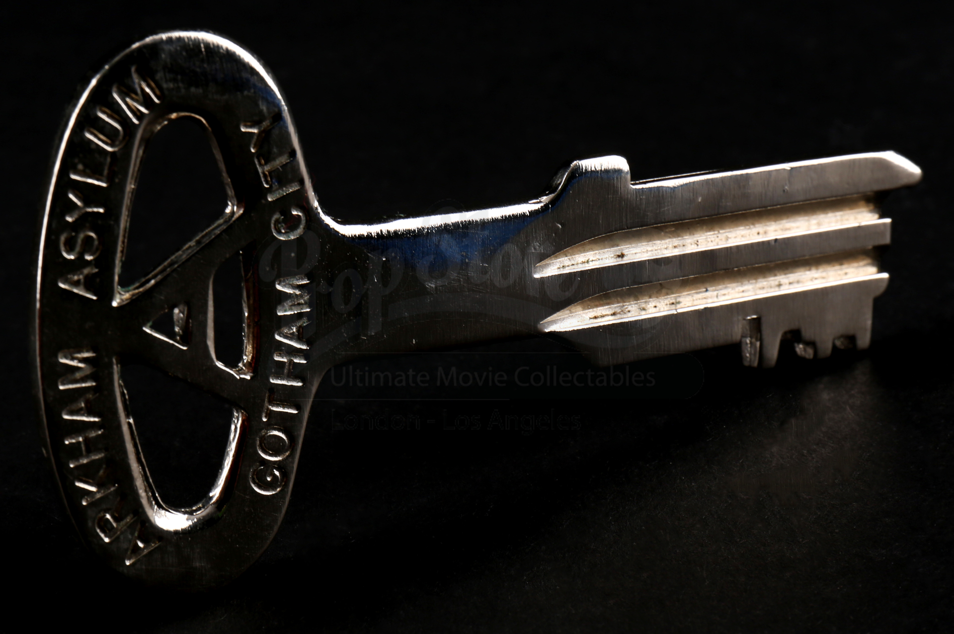 Silver Arkham Asylum Key | Prop Store - Ultimate Movie Collectables