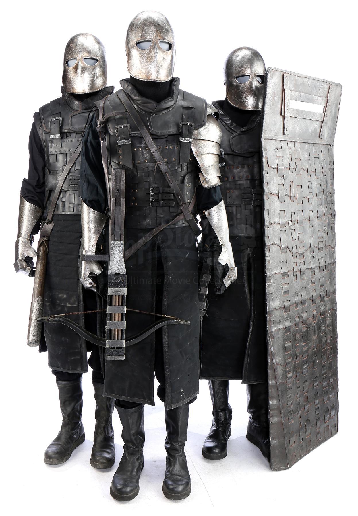 Lot # 92: ROBIN HOOD (2018) - Three Crossman Guard Costumes with Weaponry