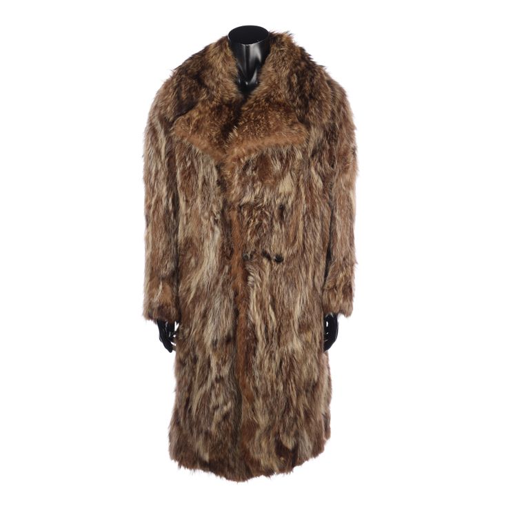 14. George Harrison's Custom-Made Fur Coat ### THE BEATLES