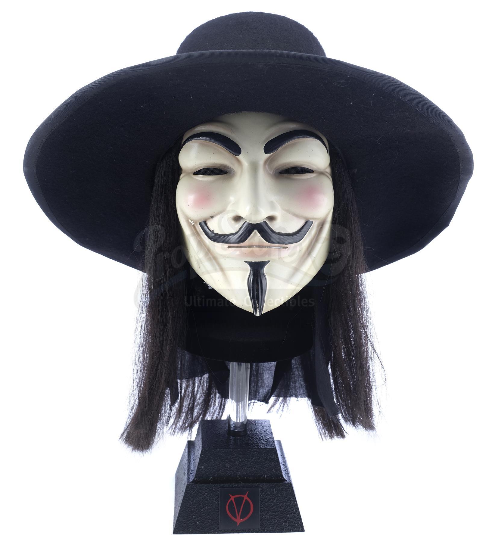 Lot # 403: V FOR VENDETTA (2005) - Crowd Member's V Mask, Hat, and Wig