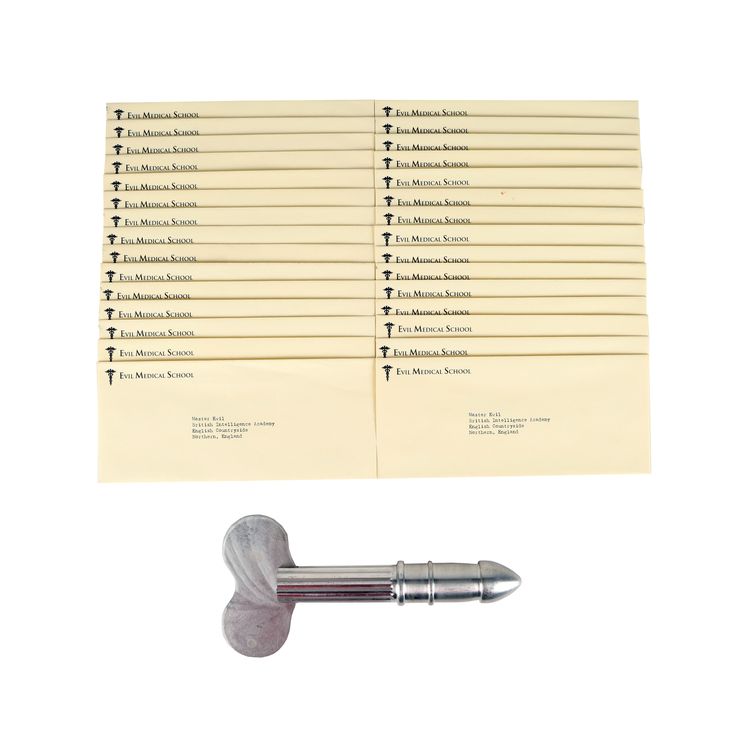 Lot 693 - Goldmember Key Prototype, Evil Medical School Envelopes ...