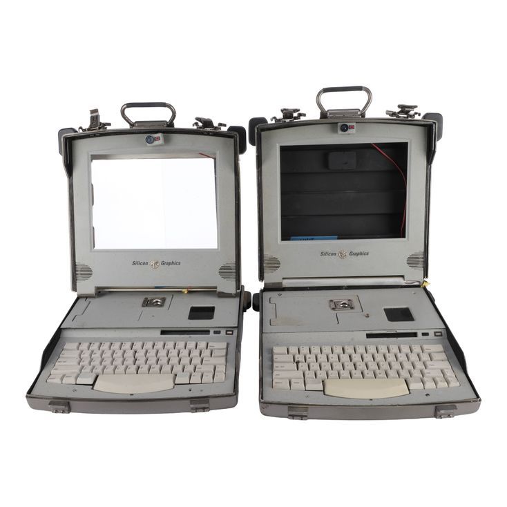 Lot 592. Pair of TraviCom Briefcase Computers | CONGO (1995)