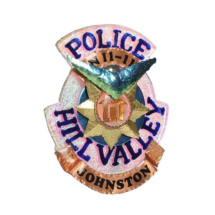 Lot # 897: BACK TO THE FUTURE PART II (1989) - Hill Valley Police Badge ...