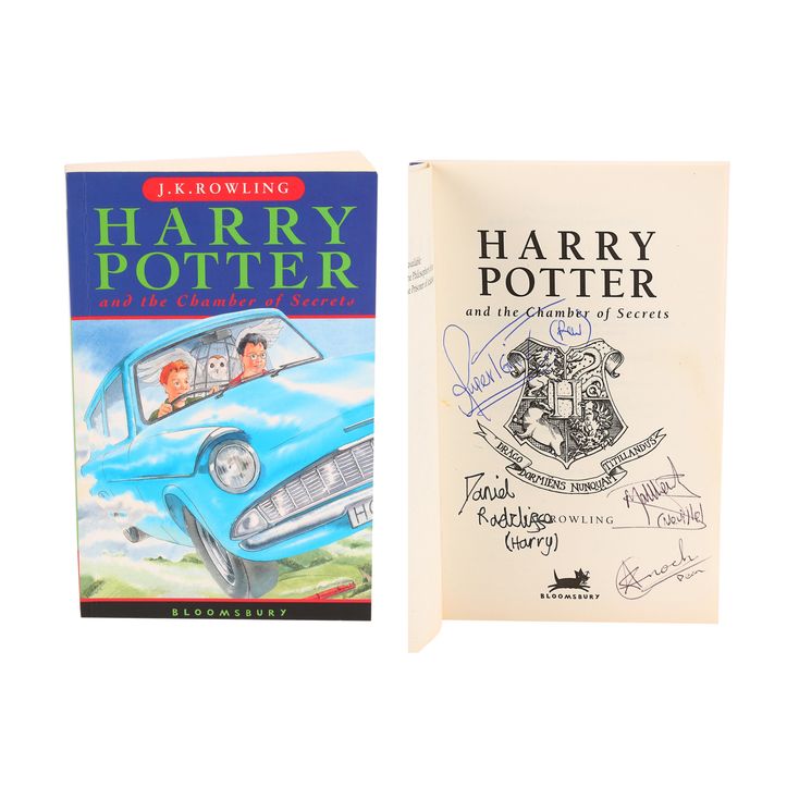 Lot 1215. Daniel Radcliffe and Cast-Autographed Paperback Book | HARRY ...